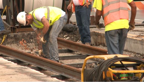 Tracks for Loop trolley being installed | ksdk.com