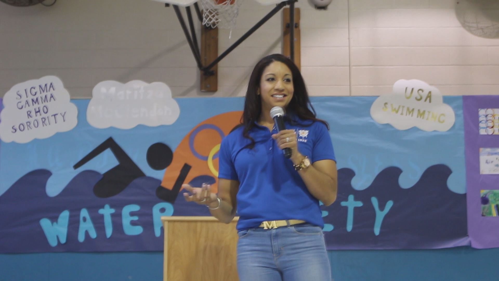 Olympic swimmer pays visit to Ferguson school | ksdk.com