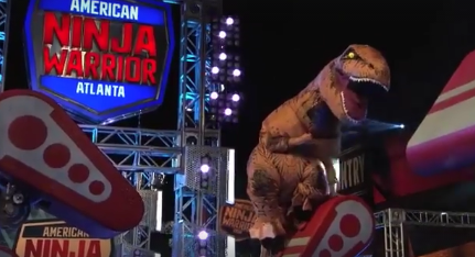 This hero ran the 'American Ninja Warrior' course in a T-Rex costume ...