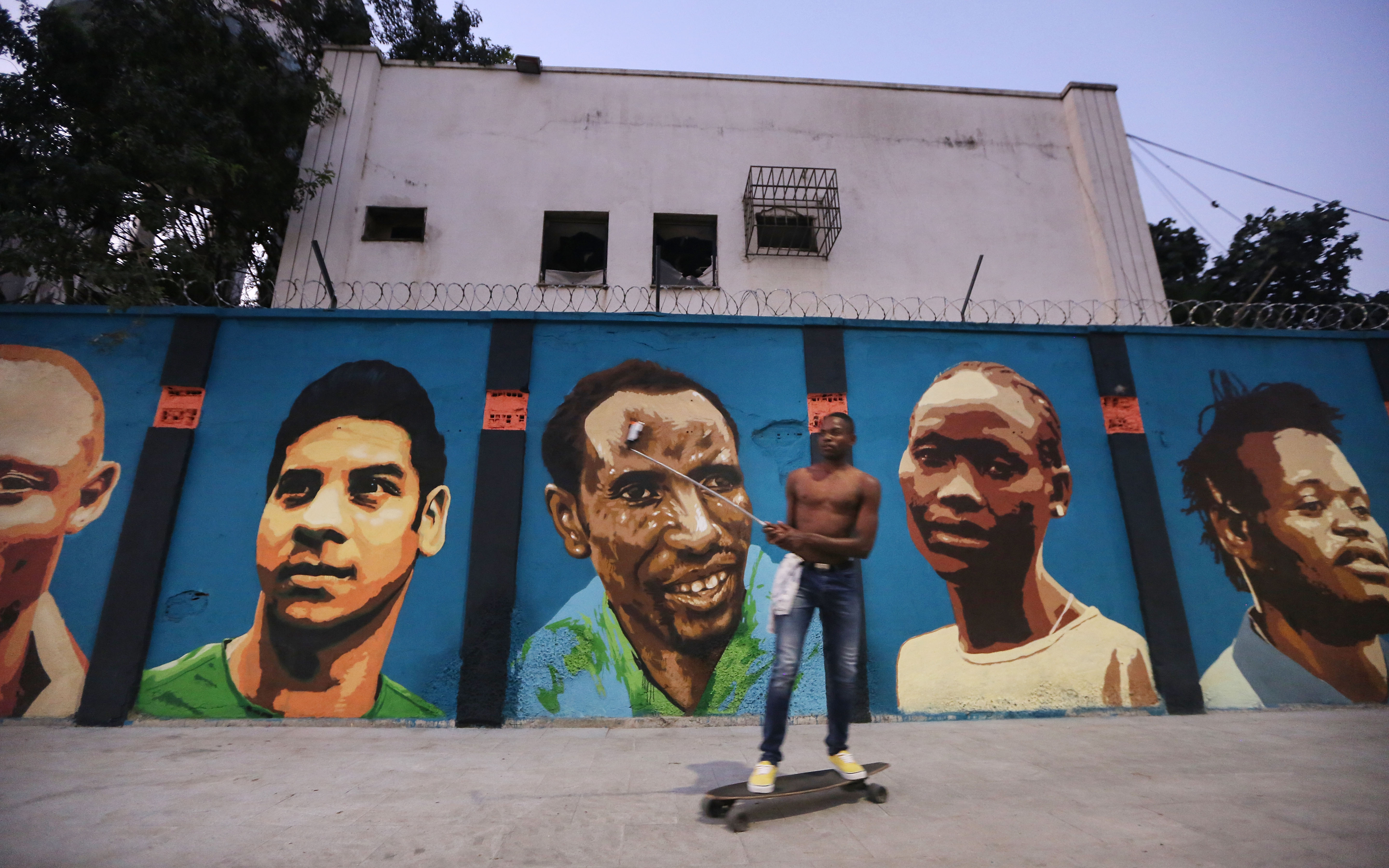 Photos: Mural of Olympic Refugee Team members | kgw.com